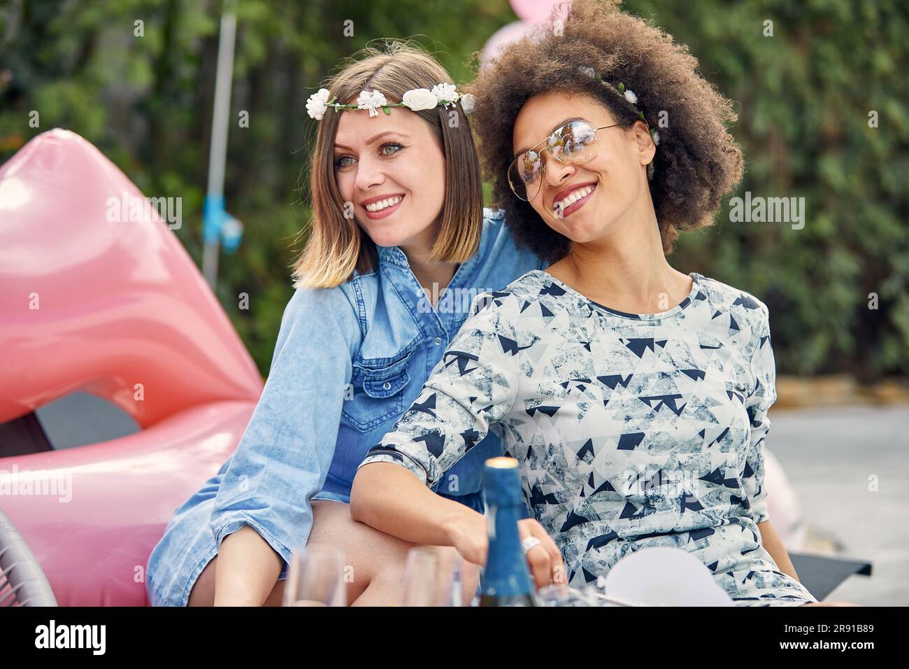 Two best friends are captured in a moment of pure joy and laughter at a ...