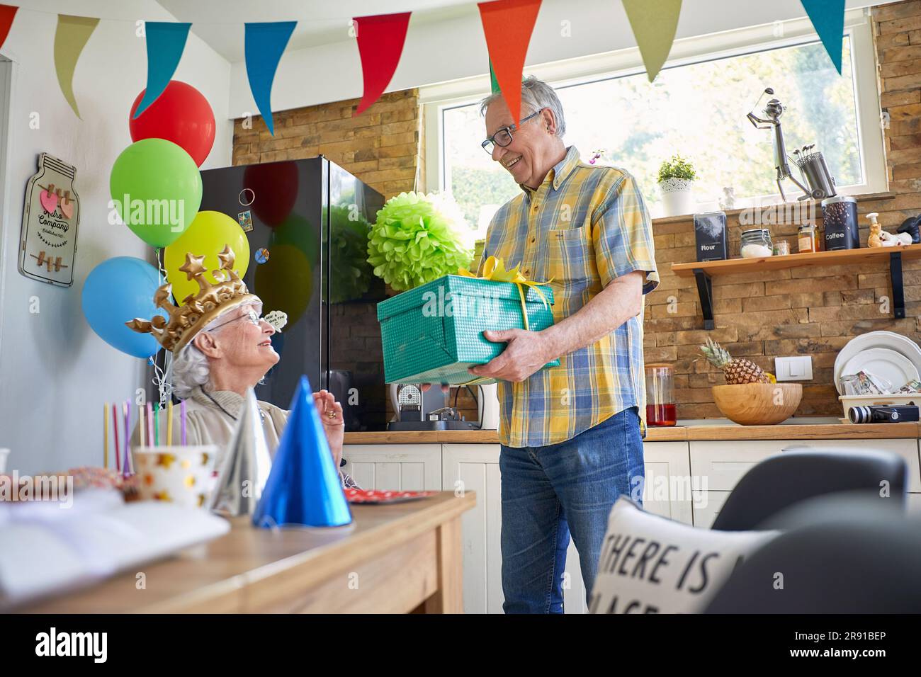 Beautiful birthday celebration as a beloved grandma is surrounded by ...