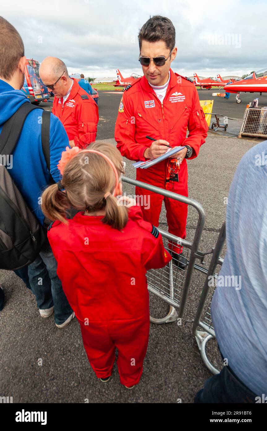 David Montenegro and other Red Arrows pilots signing autographs for ...