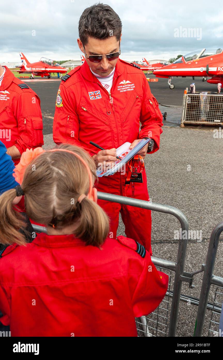 David Montenegro and other Red Arrows pilots signing autographs for ...