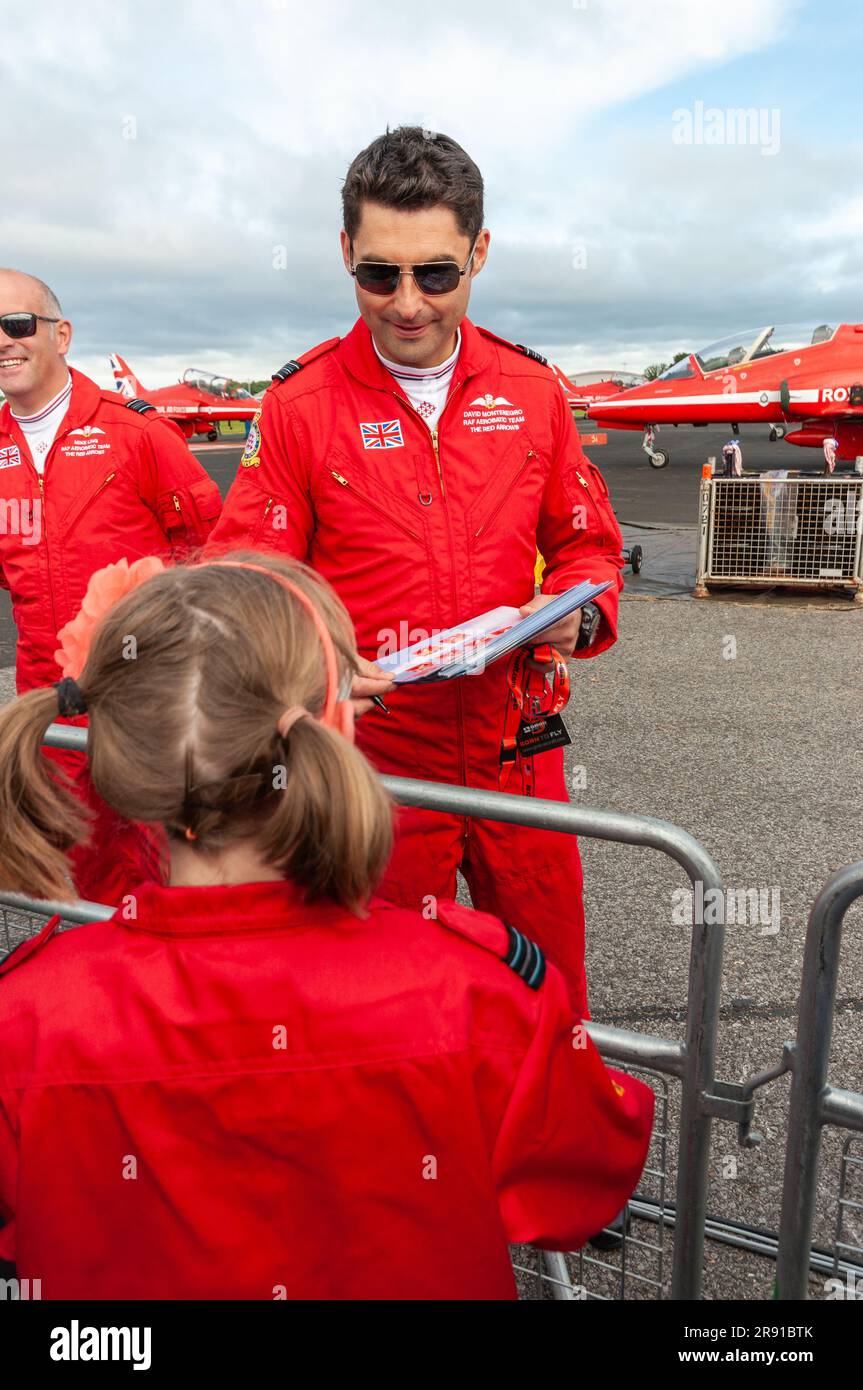 David Montenegro and other Red Arrows pilots signing autographs for ...