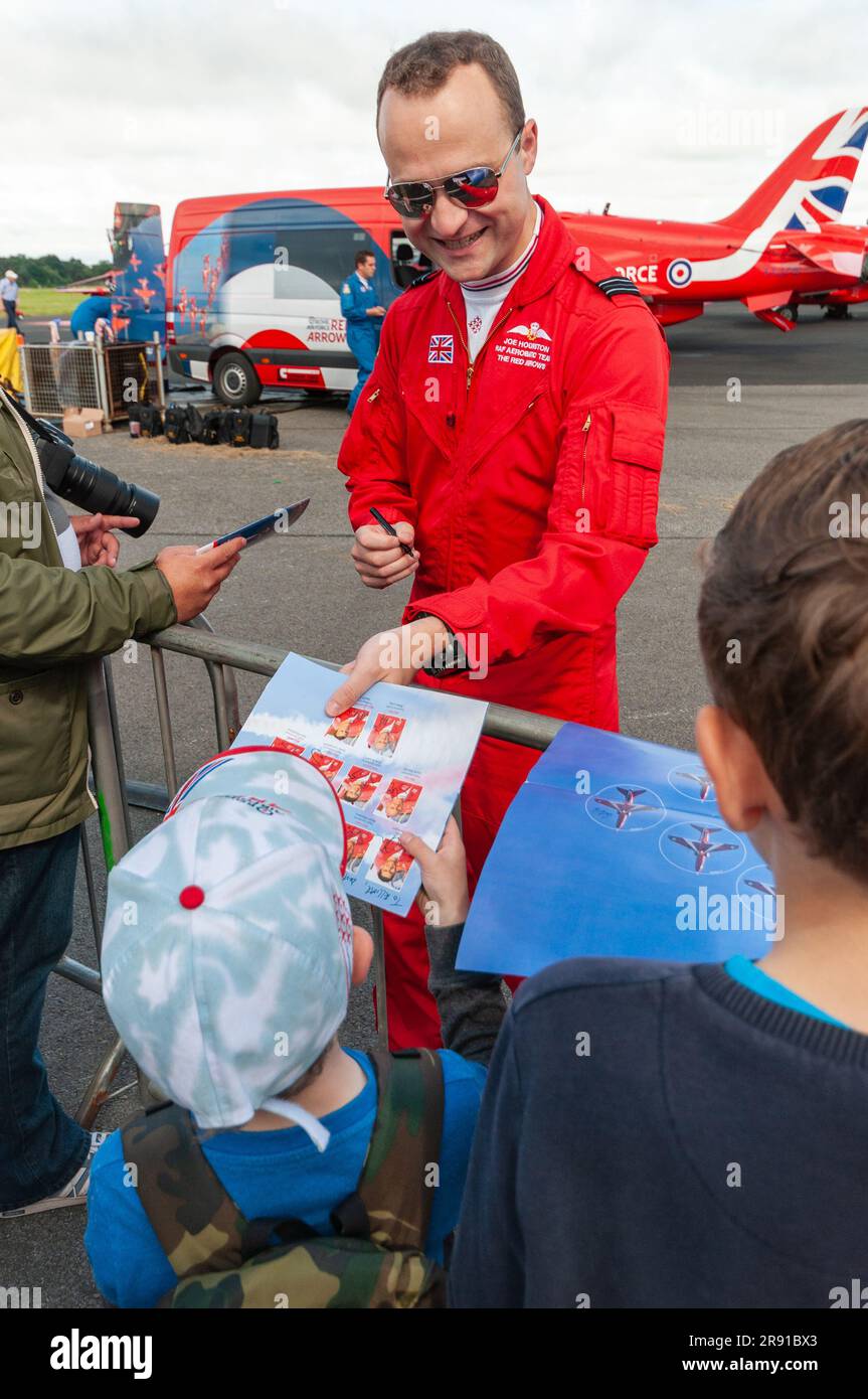 Joe Hourston and other Red Arrows pilots signing autographs for fans at ...