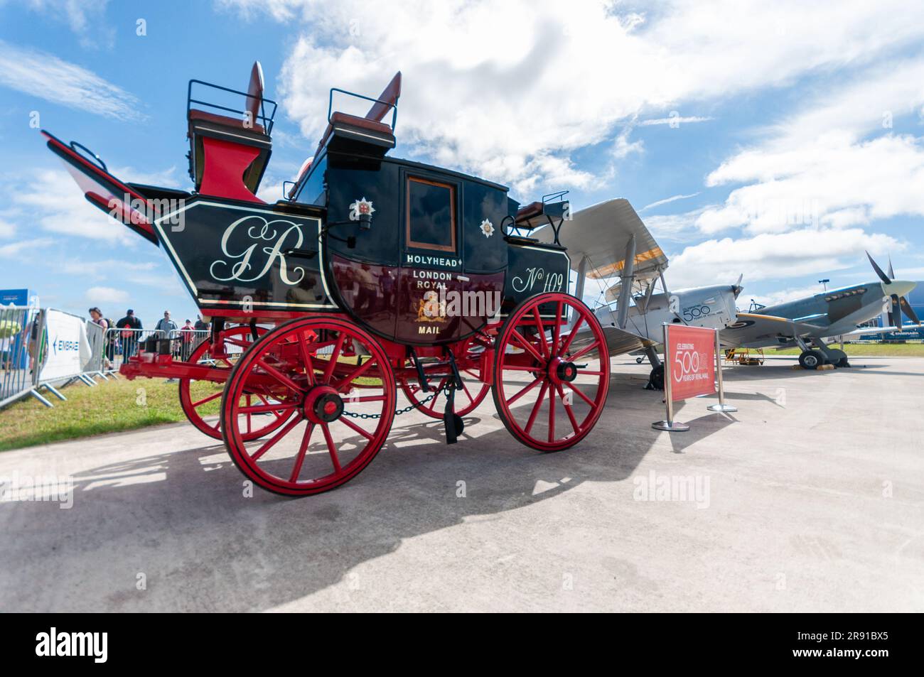 Celebrating 500 years of Royal Mail. Coach, Tiger Moth biplane plane ...