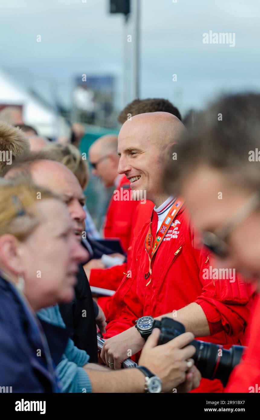Steve Morris and other Red Arrows pilots signing autographs for fans at ...