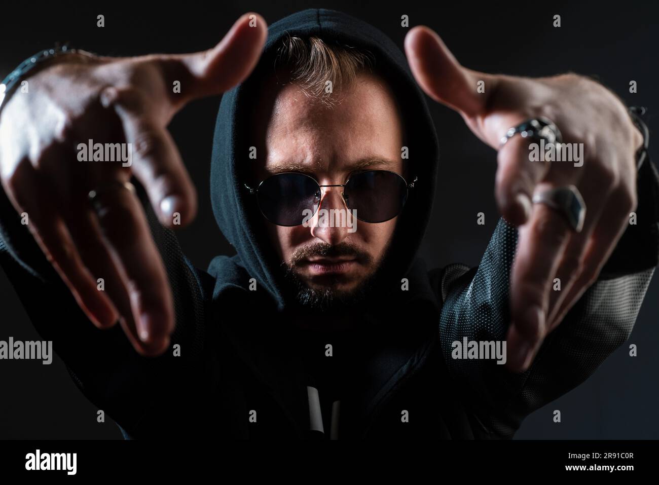 Close up portrait of guy with serious face. Hand rap gestures Stock ...