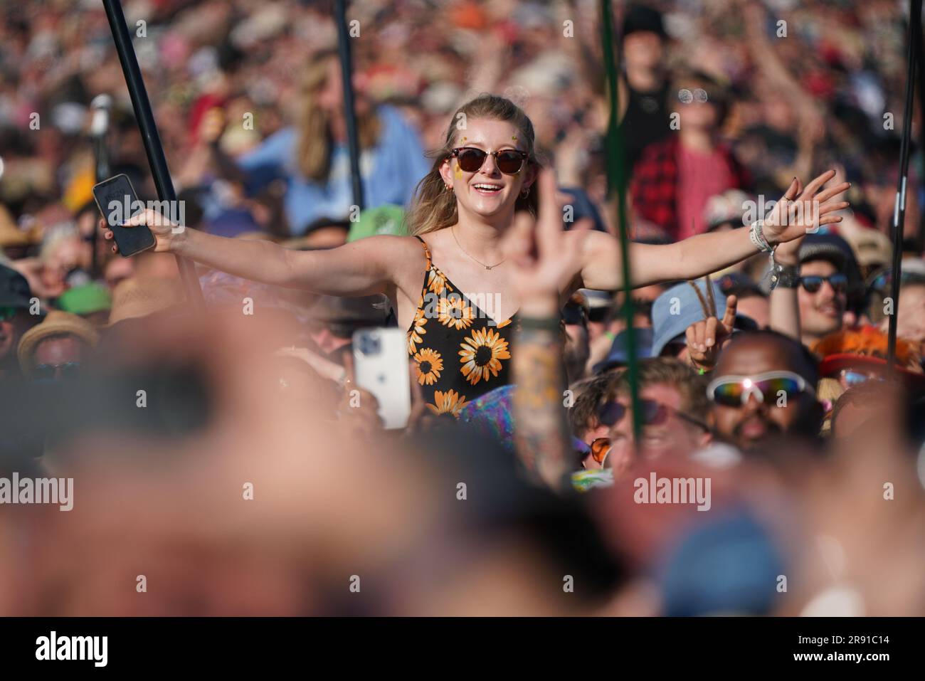 Crowds watch the Foo Fighters, performing under the name 'The ChurnUps ...