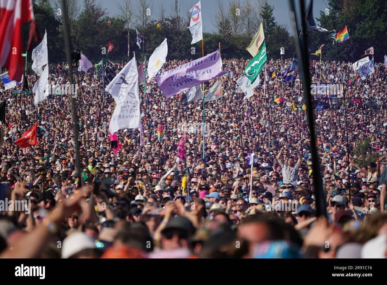 Crowds watch the Foo Fighters, performing under the name 'The ChurnUps ...