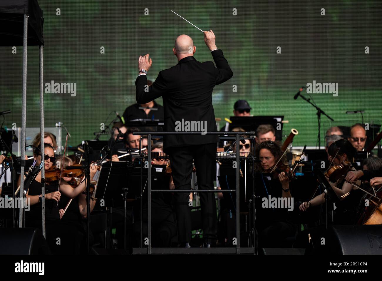 Conductor Michael England performing on stage at BST Hyde Park in ...