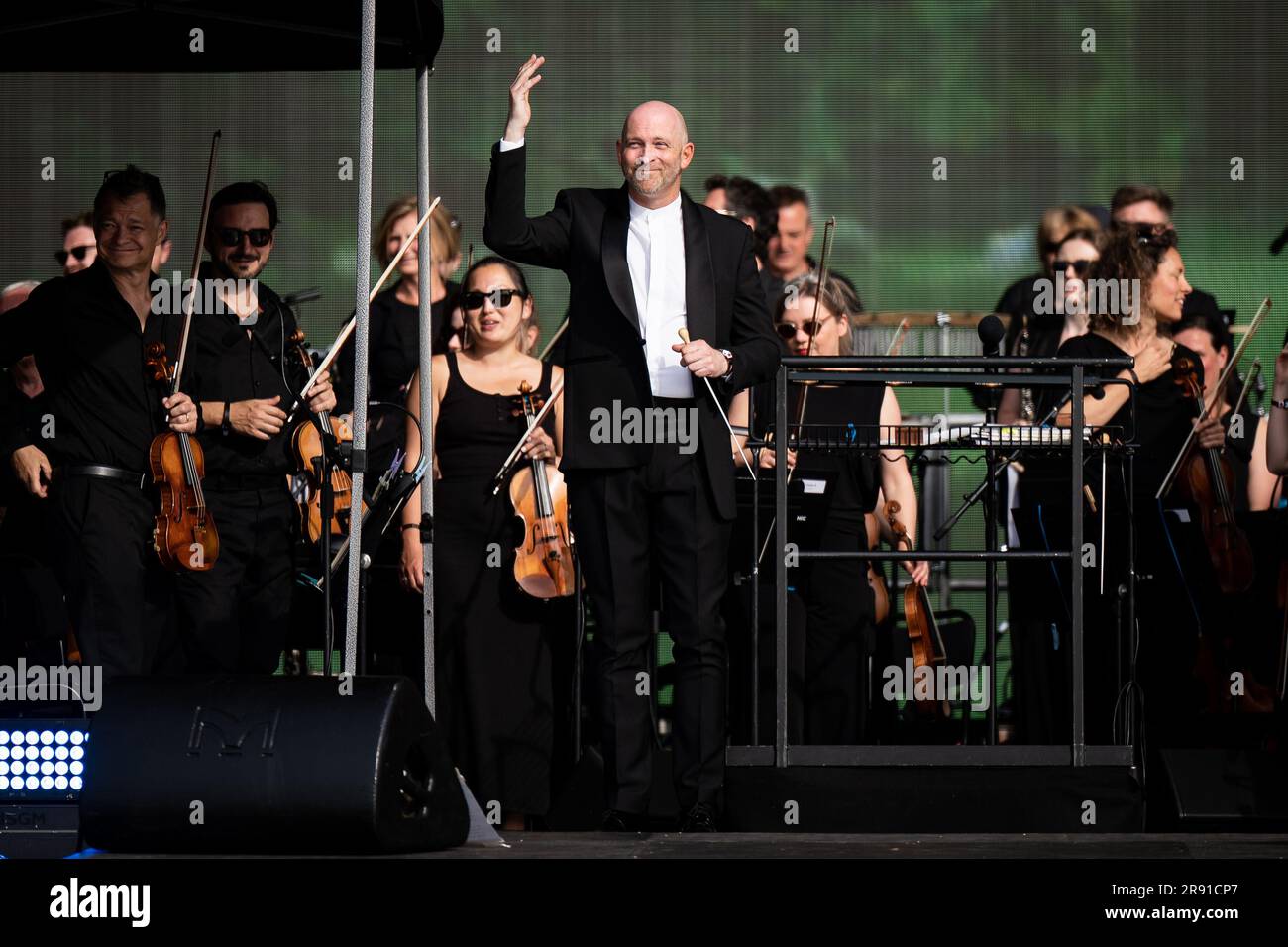 Conductor Michael England performing on stage at BST Hyde Park in ...
