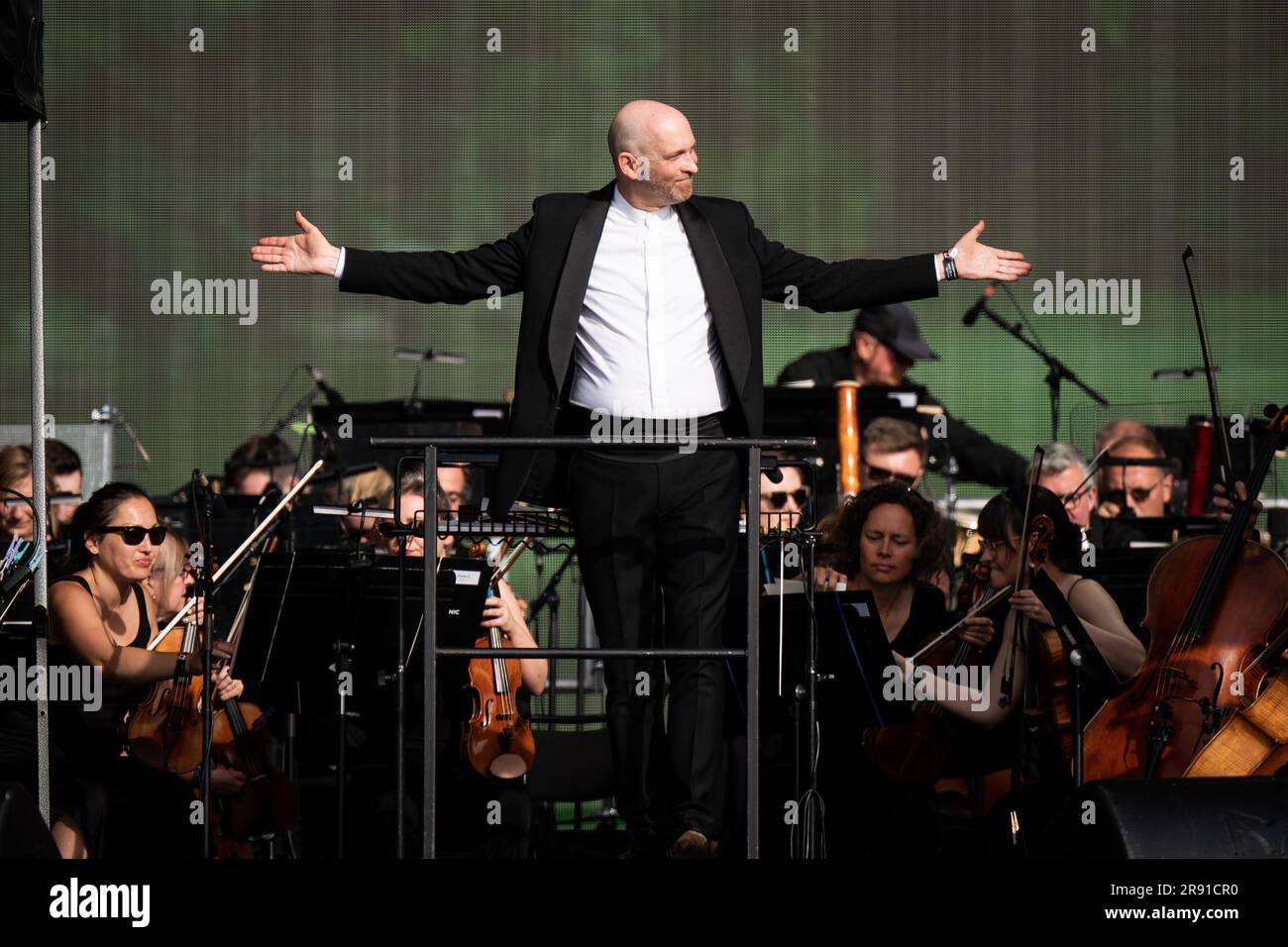 Conductor Michael England performing on stage at BST Hyde Park in ...