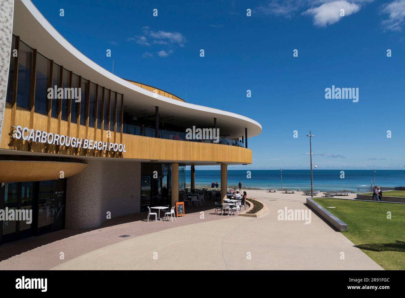Side view of Scarborough beach swimming pools entrance with the sea and ...