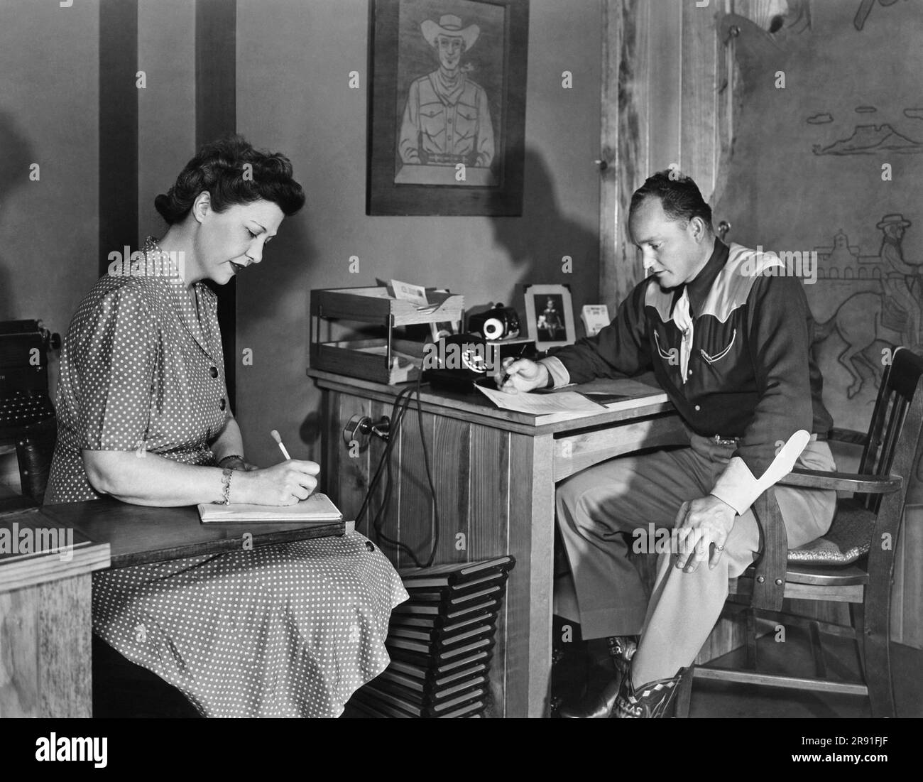 Yoakum, Texas: 1936 A man and his secretary at the Texas Ranger Leather ...
