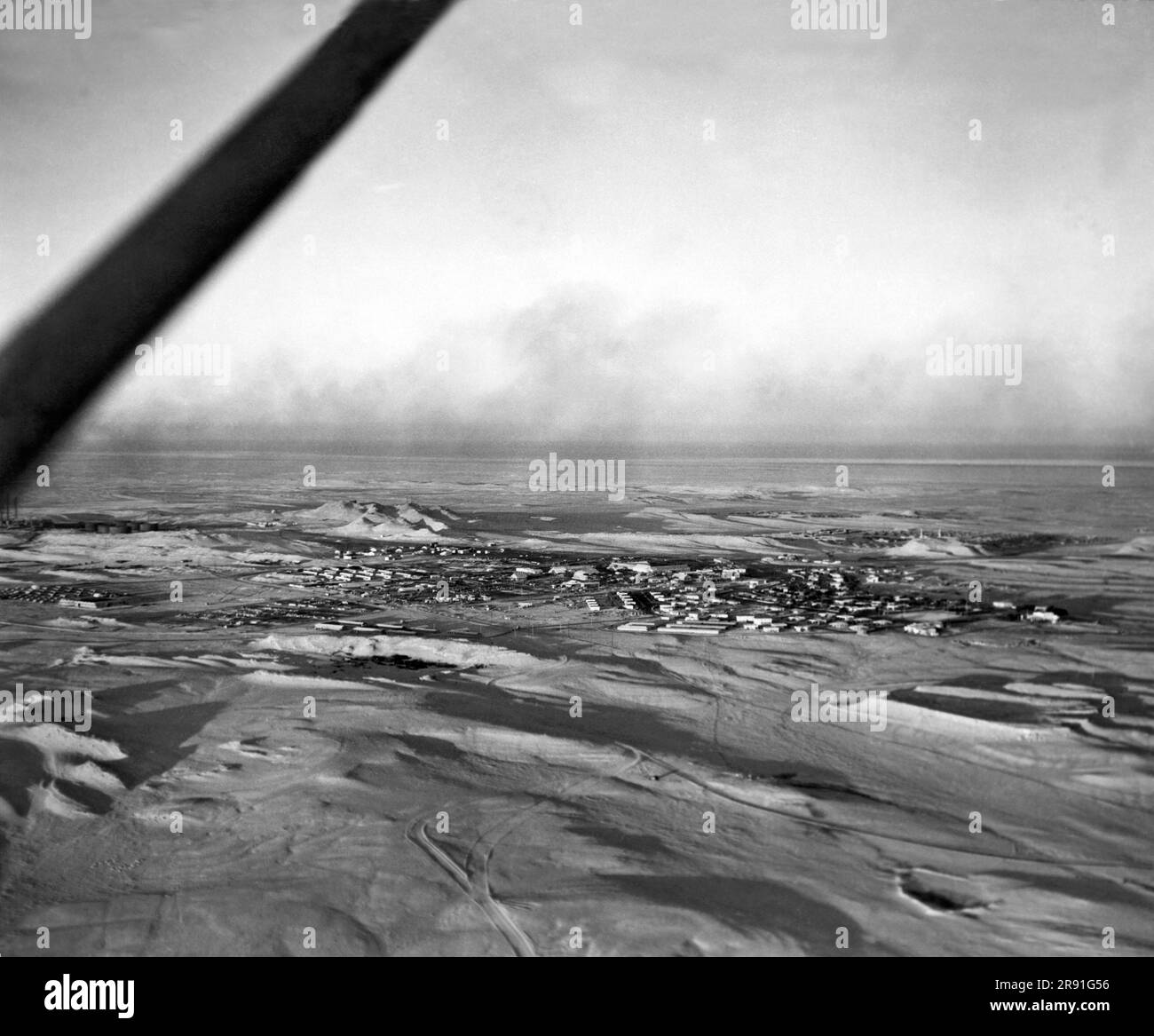Dhahran, Saudi Arabia: February 21, 1947. An aerial view of the town of ...