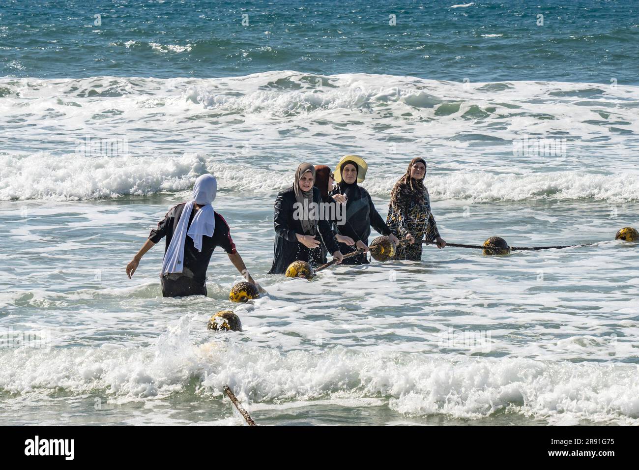 Tel Aviv, Israel - September 15th, 2022: Muslim women enjoying the ...