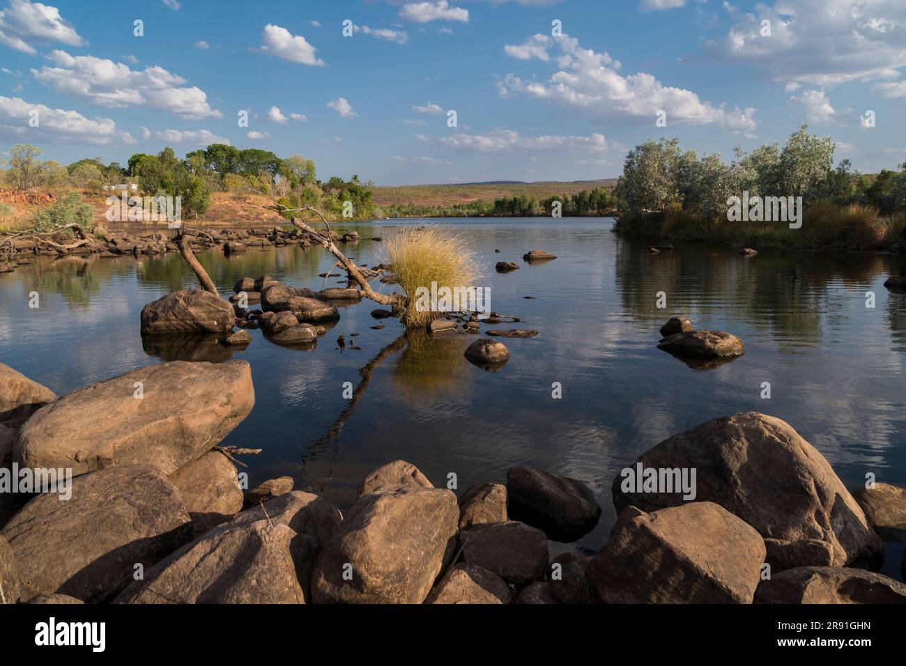 Scenic views of the Chamberlain River with rocks in the foreground near ...