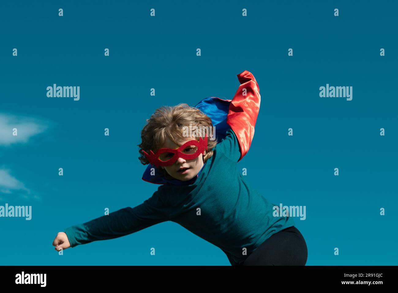 Excited child boy dressed like superhero. Super hero concept Stock ...