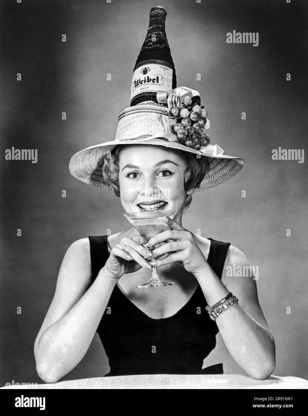 Vintage woman drinking bottle hi-res stock photography and images - Alamy