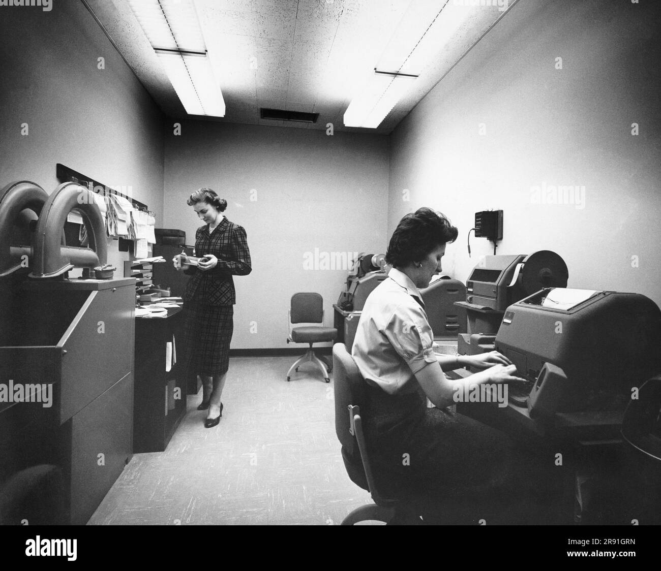 New York, New York: January 17, 1958 The BOAC Teletype Room at the NY International Airport ...