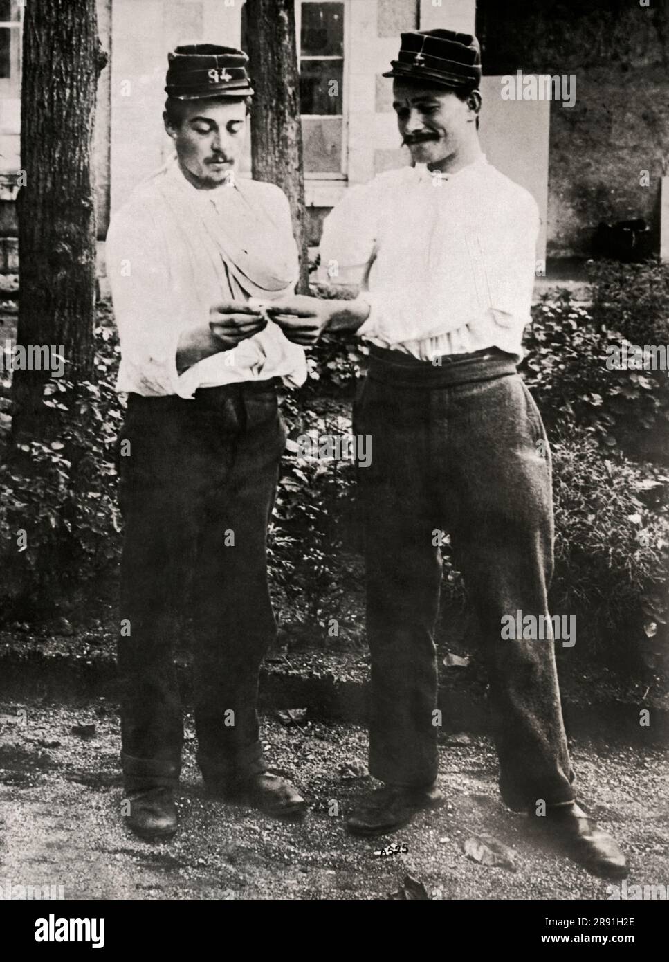 France: c. 1918 Two French soldiers who lost opposing arms in the World ...