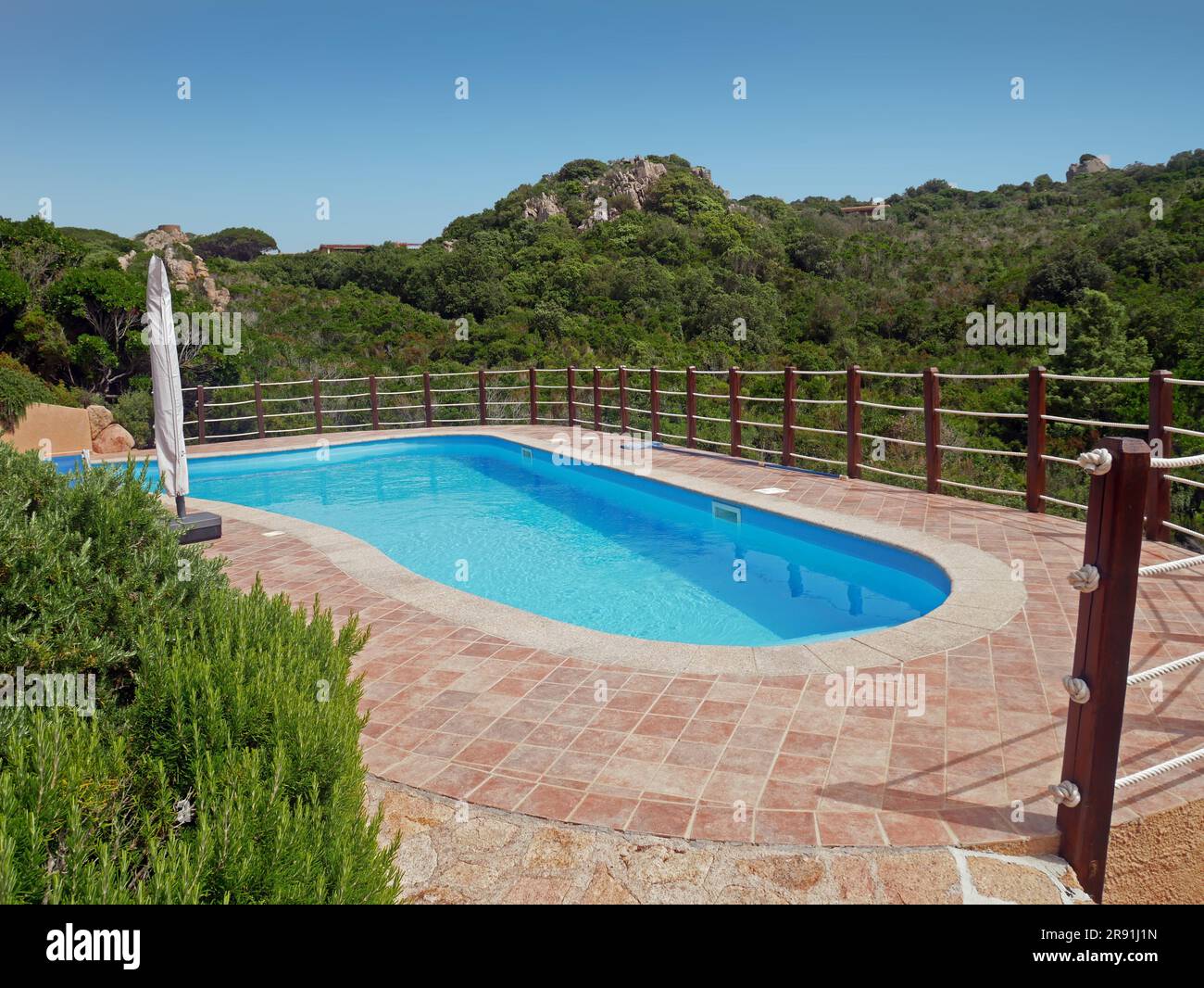 Swimming pool in nature, Sardinia, Italy Stock Photo - Alamy
