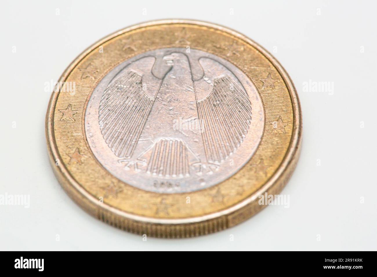 Berlin, Germany. 22nd June, 2023. An old 1-euro coin lies on the table ...