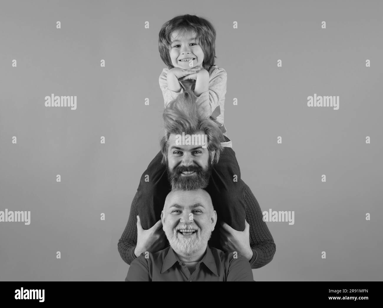 Portrait of happy grandfather father and dson smilind. Fathers day ...