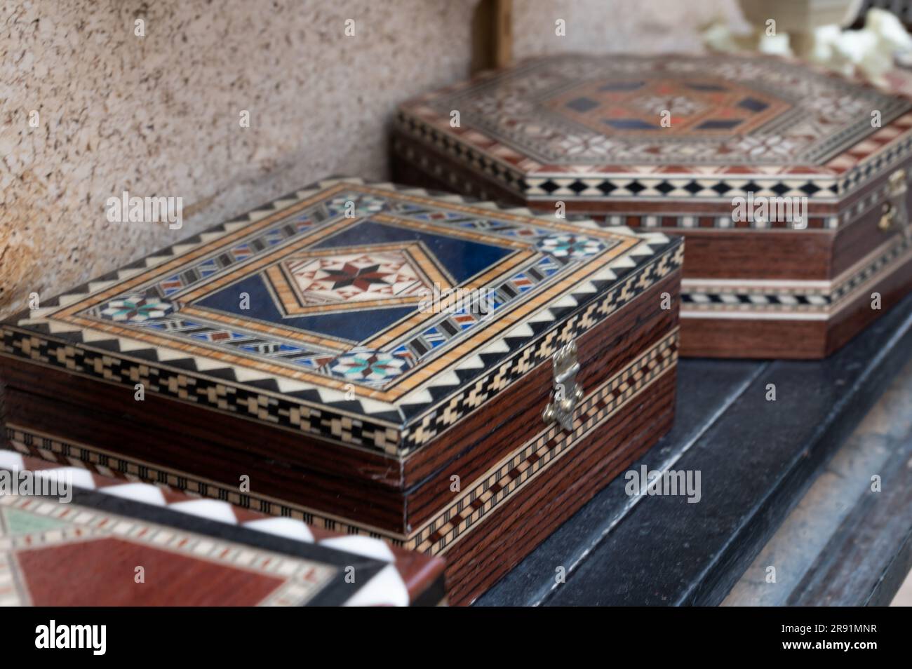 A close-up image of a selection of traditional Spanish craft items, on ...