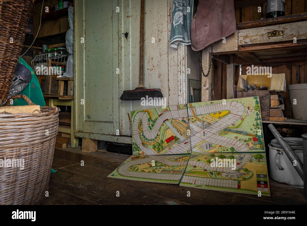 Old table game with small wooden cars on old quality color cardboard ...