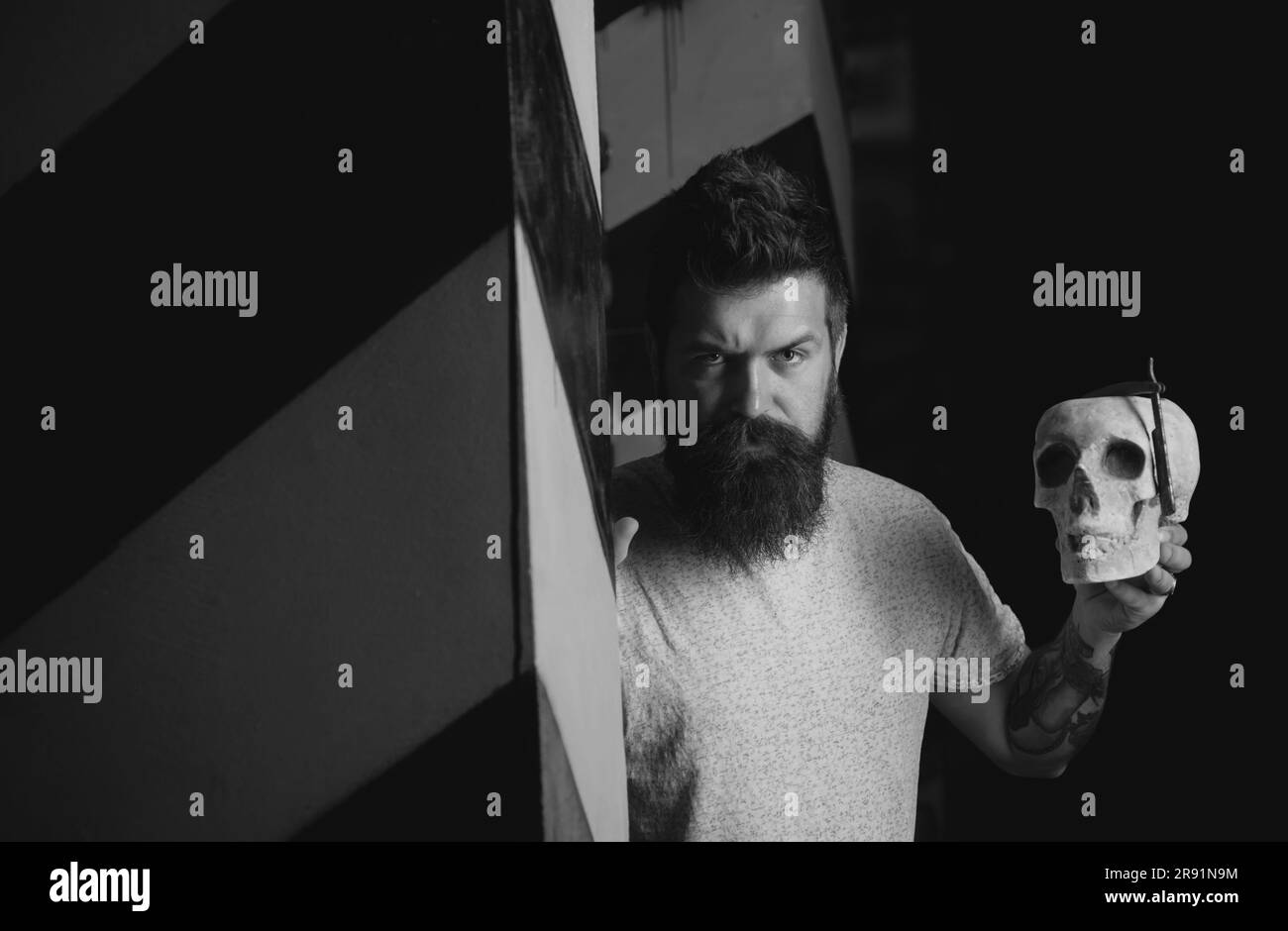 Advertising and barber shop concept. Razor sharp. He is doing styling ...