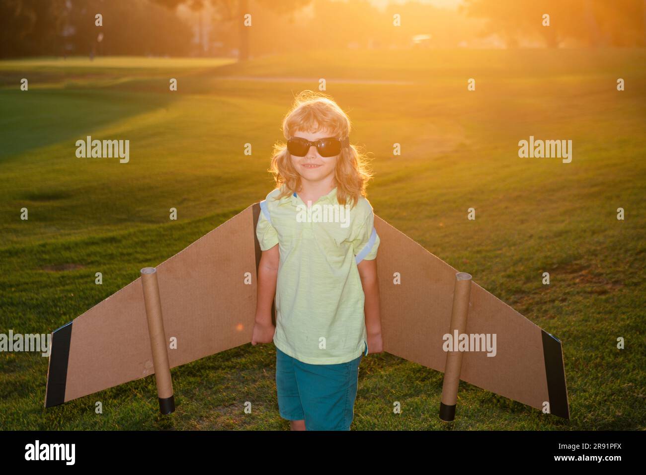 Child imagination dream to be pilot at sunset. Creative and innovation ...