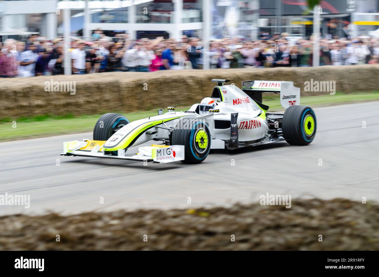 Brawn BGP 001 Formula 1, Grand Prix racing car driving up the hill ...