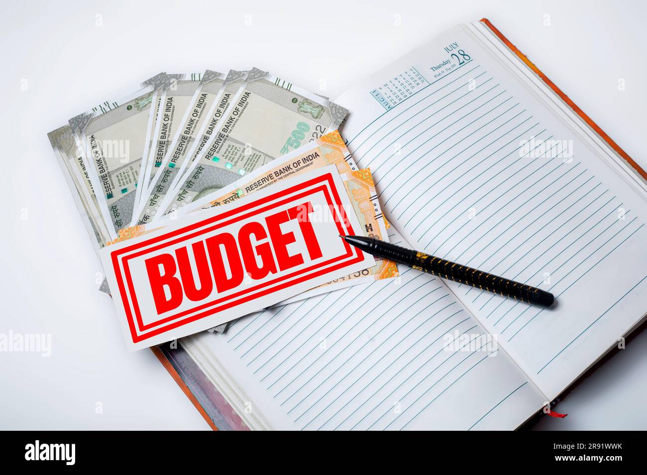 Budget Planning - Notepad with Money and Pen on White Background Stock ...