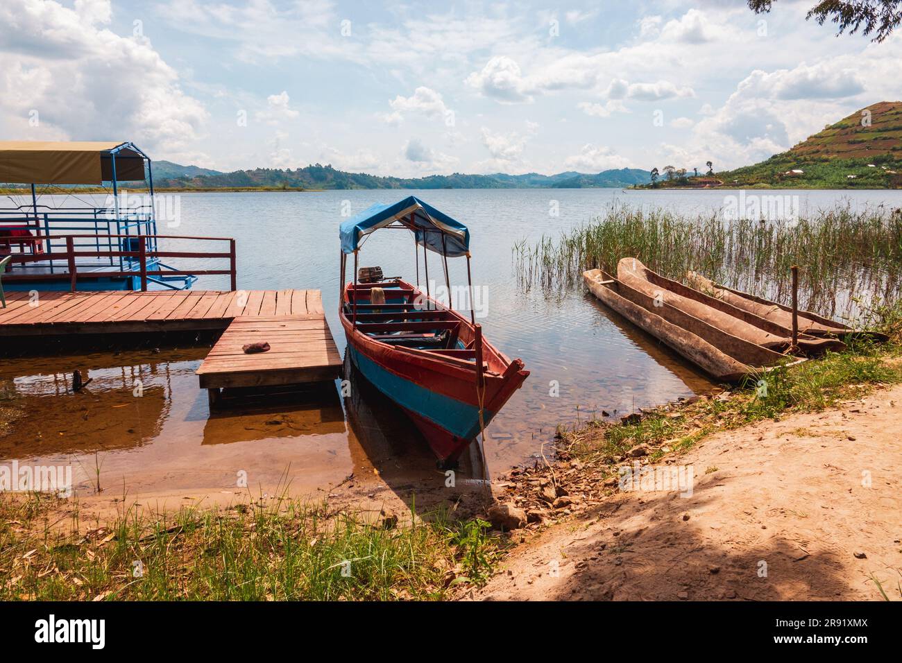 Fishing boats at the shores of Lake Muatnda in Kisoro, Uganda Stock ...