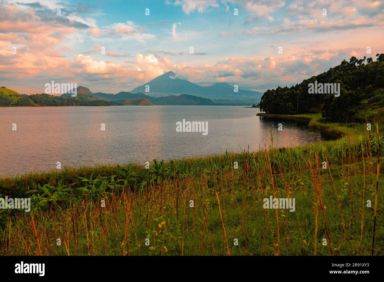 Sunset at Lake Mutanda with Mount Muhabura at the background, Kisoro ...