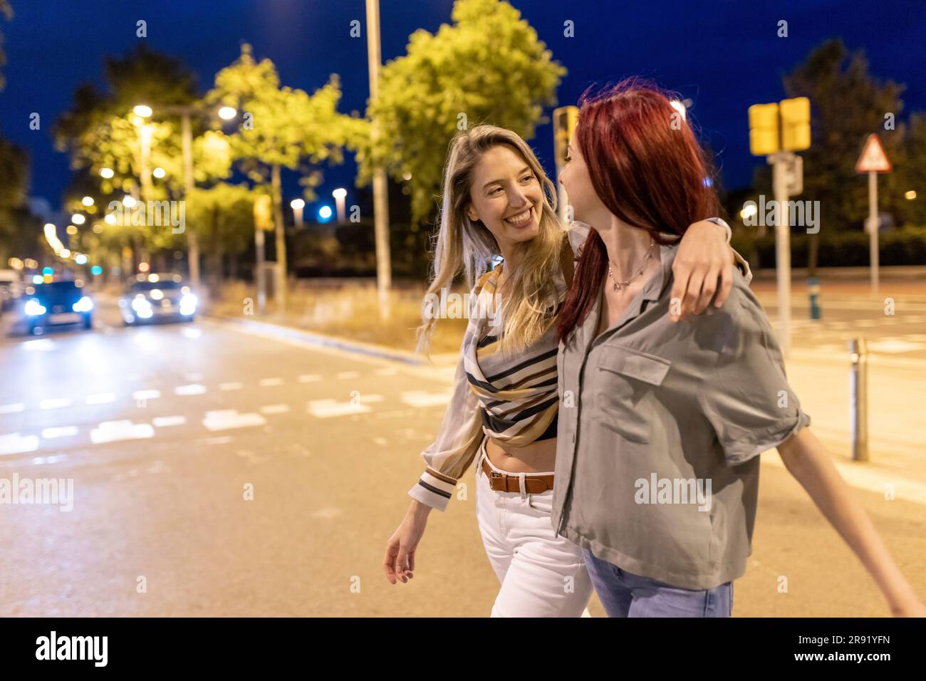 Friends Walking Together At Night