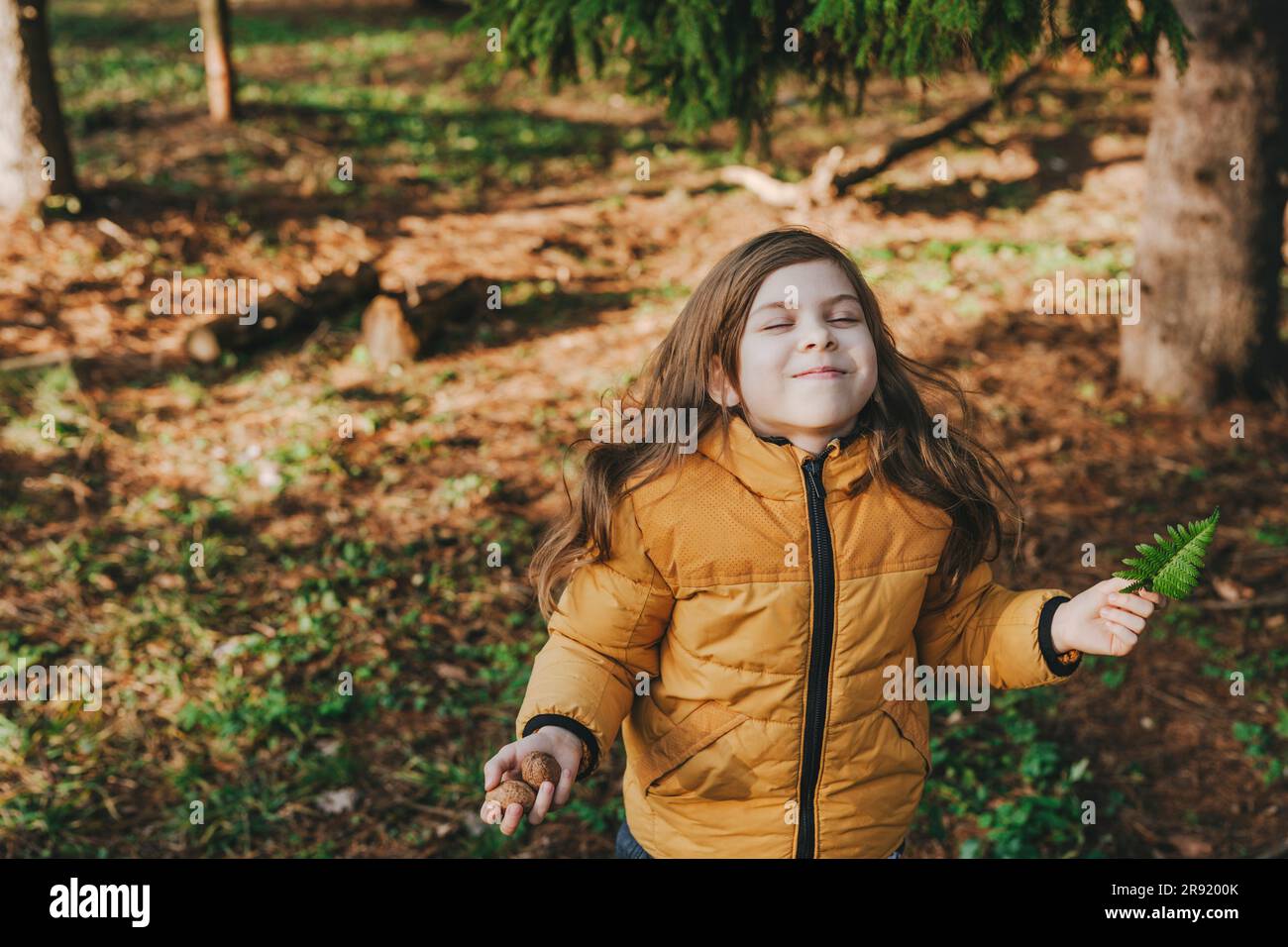 Children playing with nuts hi-res stock photography and images - Alamy