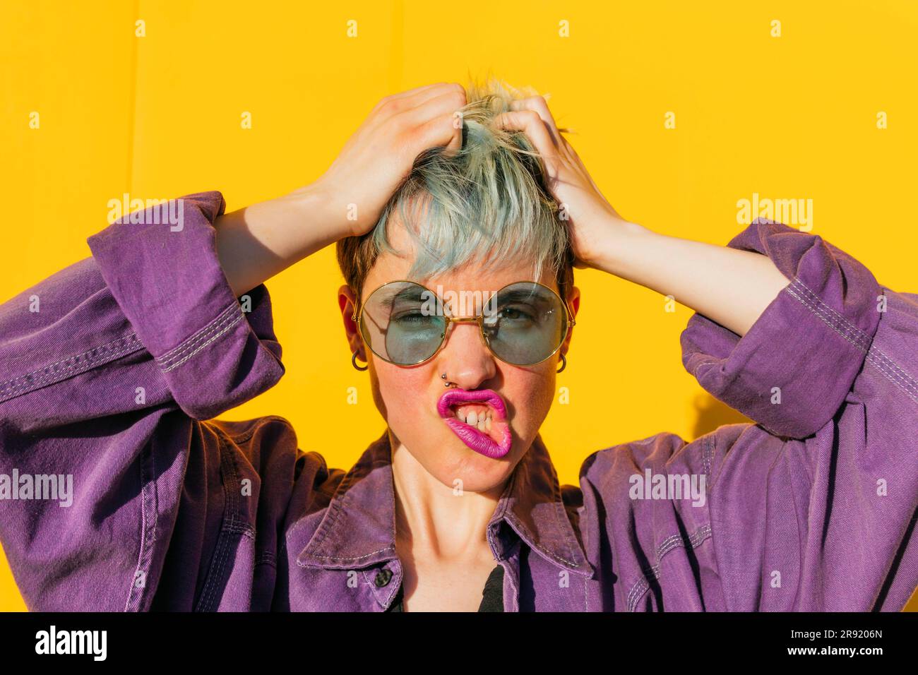 Hands near hair hi-res stock photography and images - Alamy