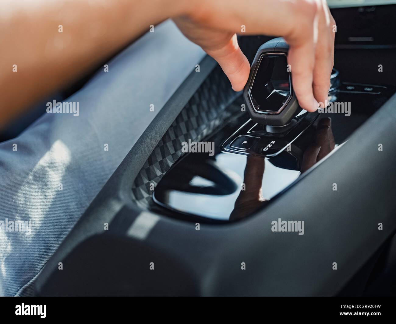 Man using gearshift in modern car Stock Photo - Alamy