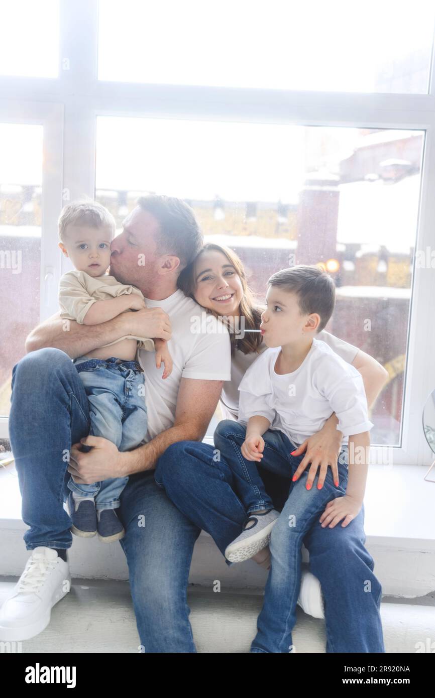 Group four sitting near hi-res stock photography and images - Alamy