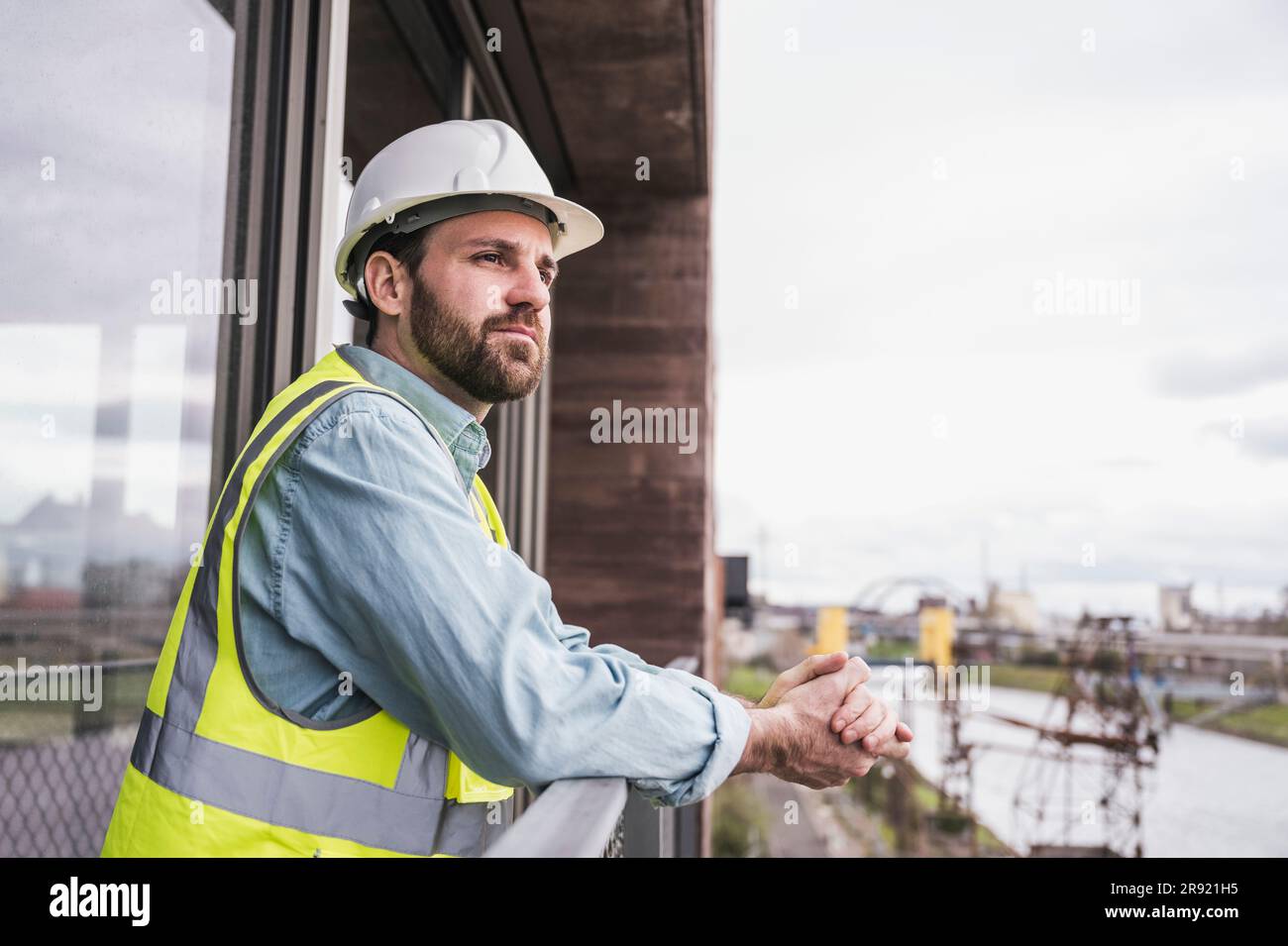 Male construction hard hat leaning hi-res stock photography and images ...