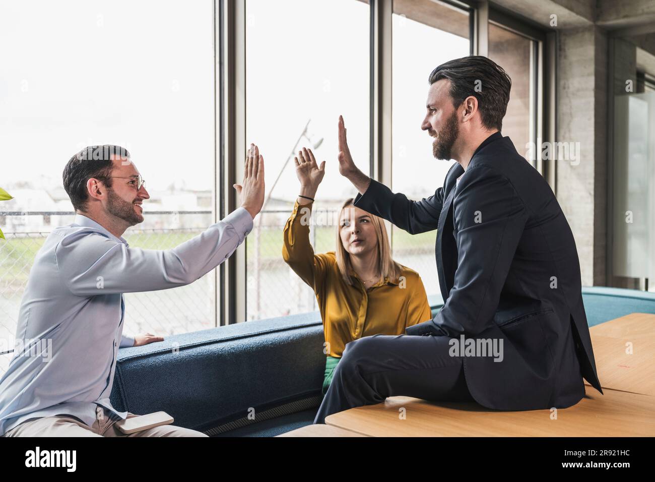 Business success high five hi-res stock photography and images - Alamy