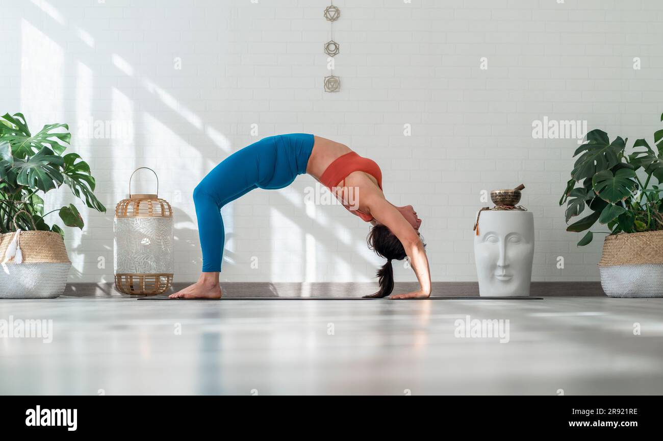 Woman yoga bridge pose hi-res stock photography and images - Alamy