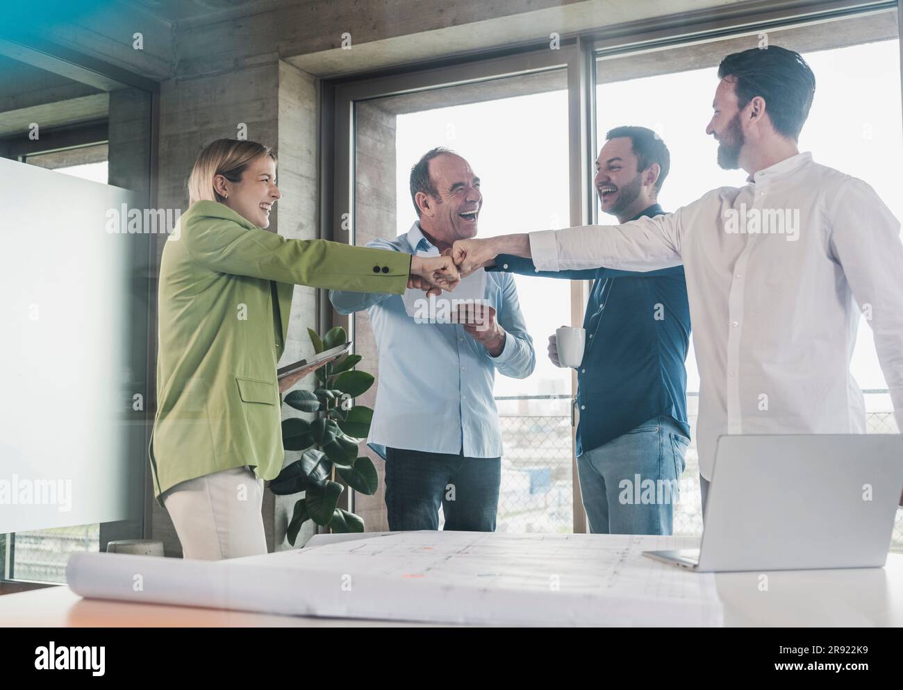 Fist bumping hi-res stock photography and images - Alamy