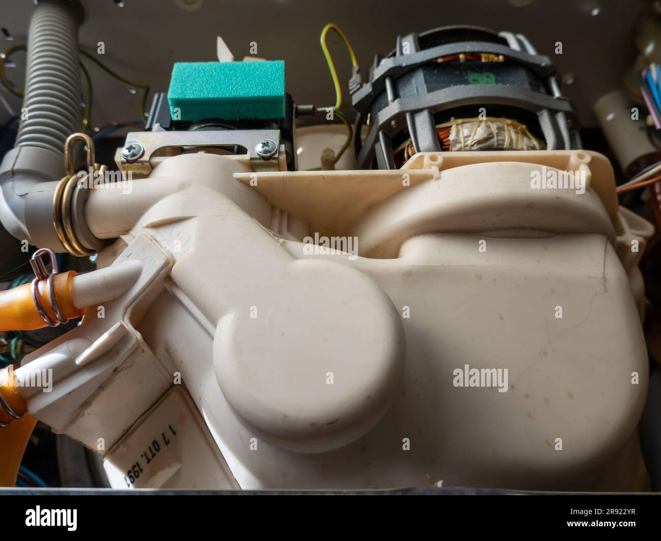 Dishwasher Details of the motor, pipes and electricity Stock Photo - Alamy