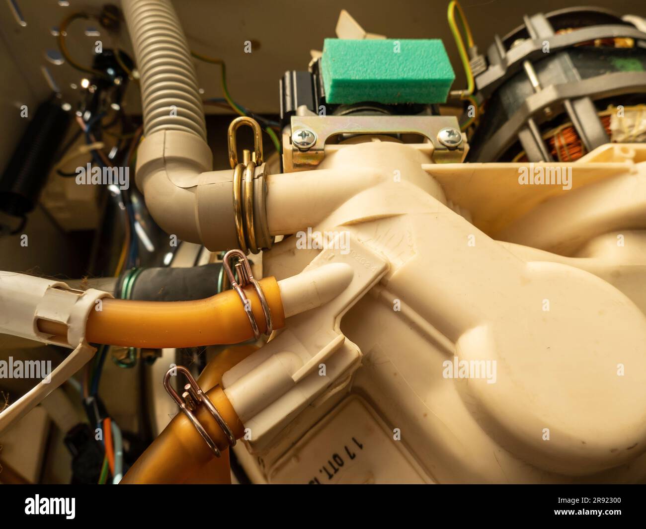 Dishwasher Details of the motor, pipes and electricity Stock Photo - Alamy