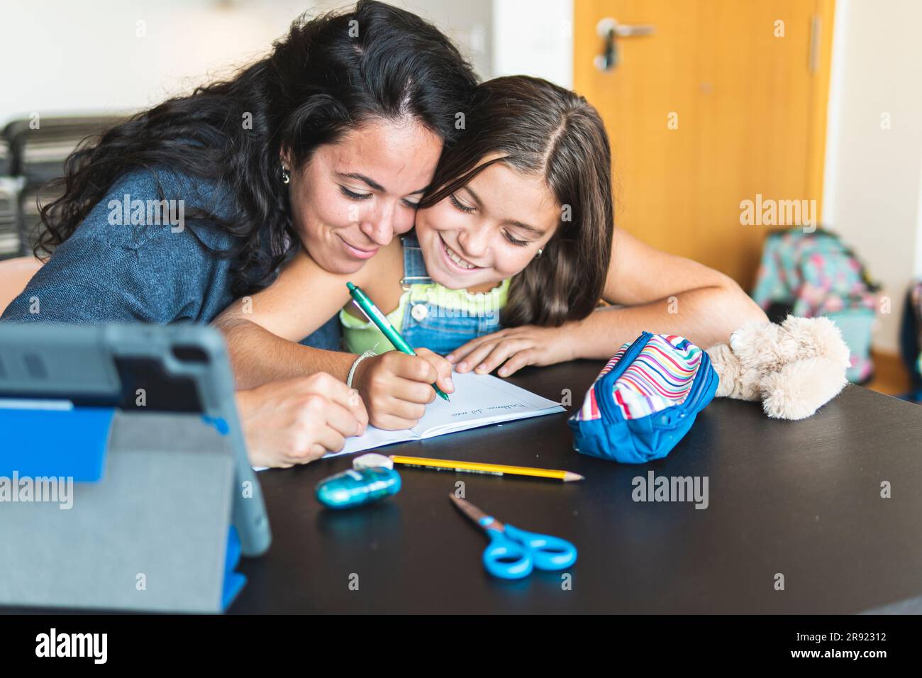 Girl tablet school supplies hi-res stock photography and images - Alamy