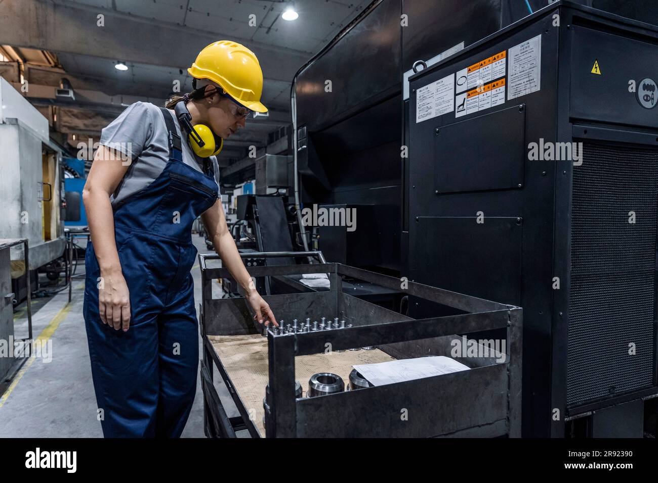 Maintenance engineer doing quality control in modern factory Stock ...