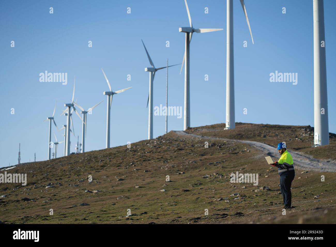 Working wind turbines standing on hi-res stock photography and images ...