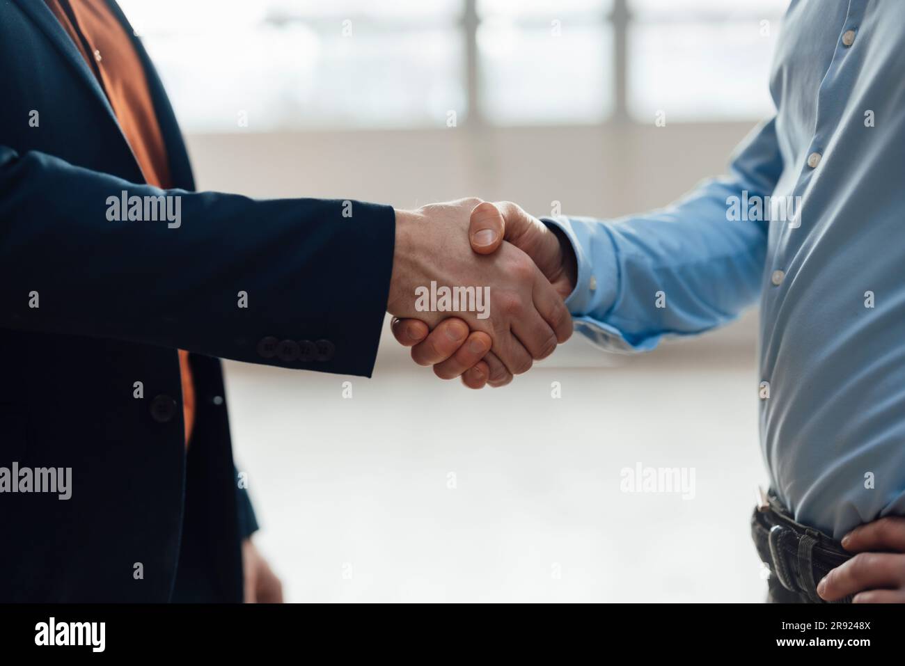 Young shaking hands with executive hi-res stock photography and images ...