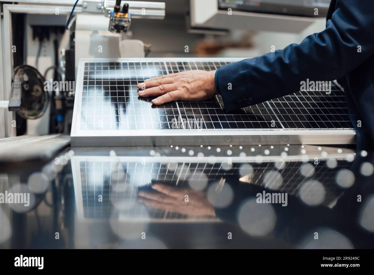 Mature man touching solar hi-res stock photography and images - Alamy